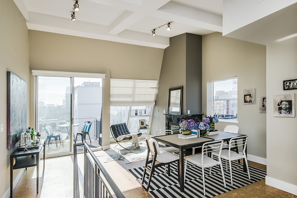 Two-level condo with patio open Sunday