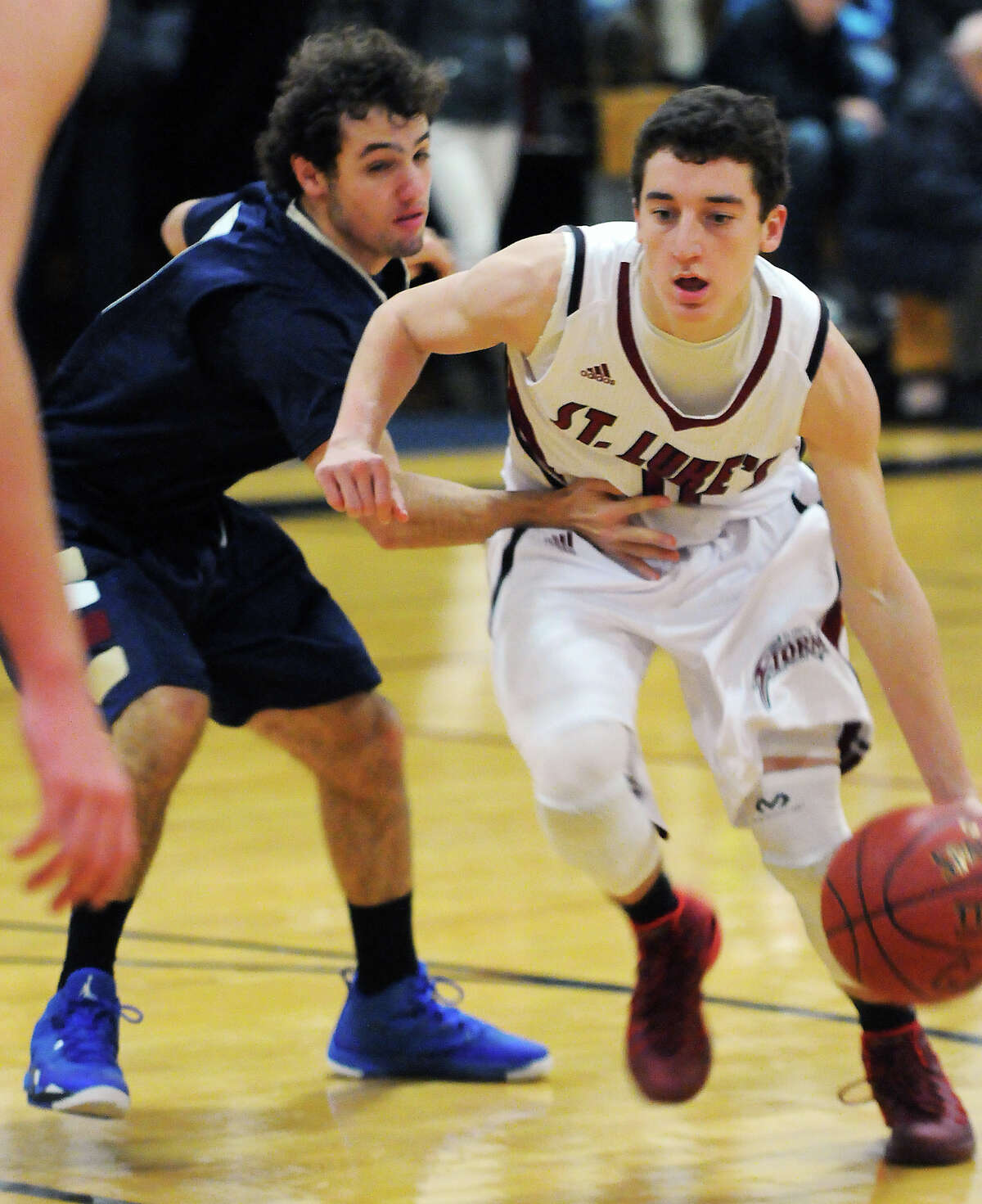 St. Luke's boys basketball team takes down King in season opener