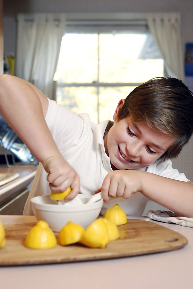 Boy, 8, opens lemonade stand to feed homeless