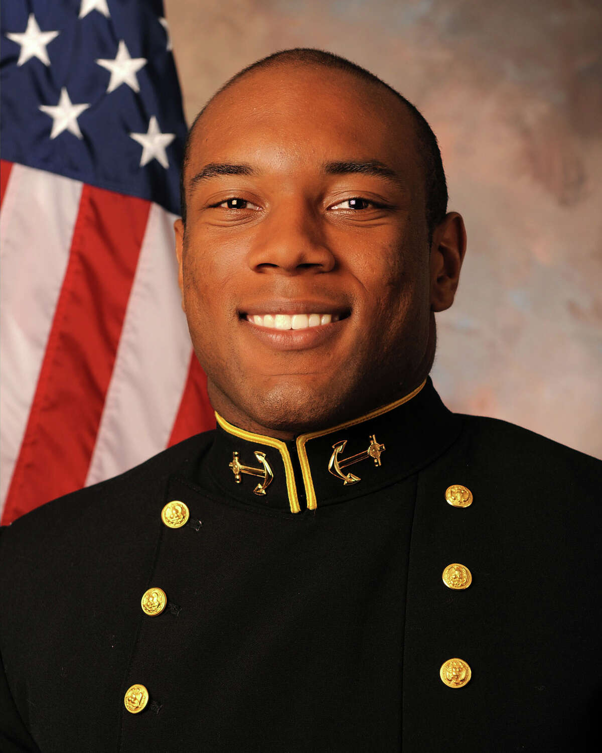 Brandeis grad Copeland packs a punch as Navy captain
