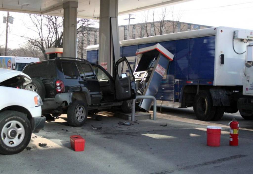 Police chase ends in gas station crash