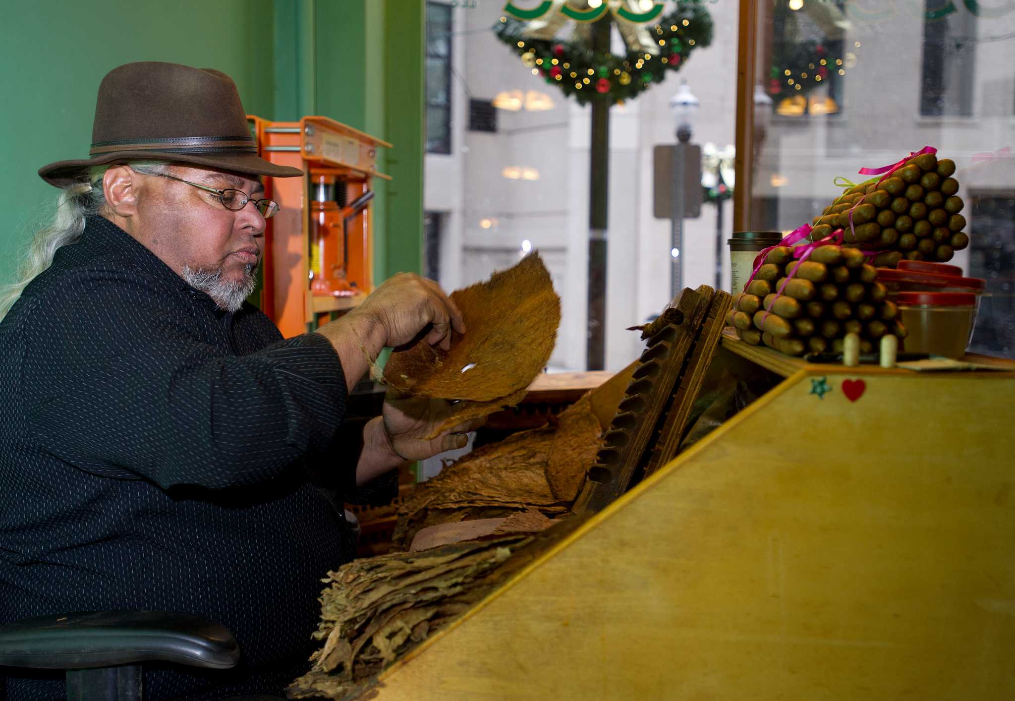 Stamford cigar business rolls along