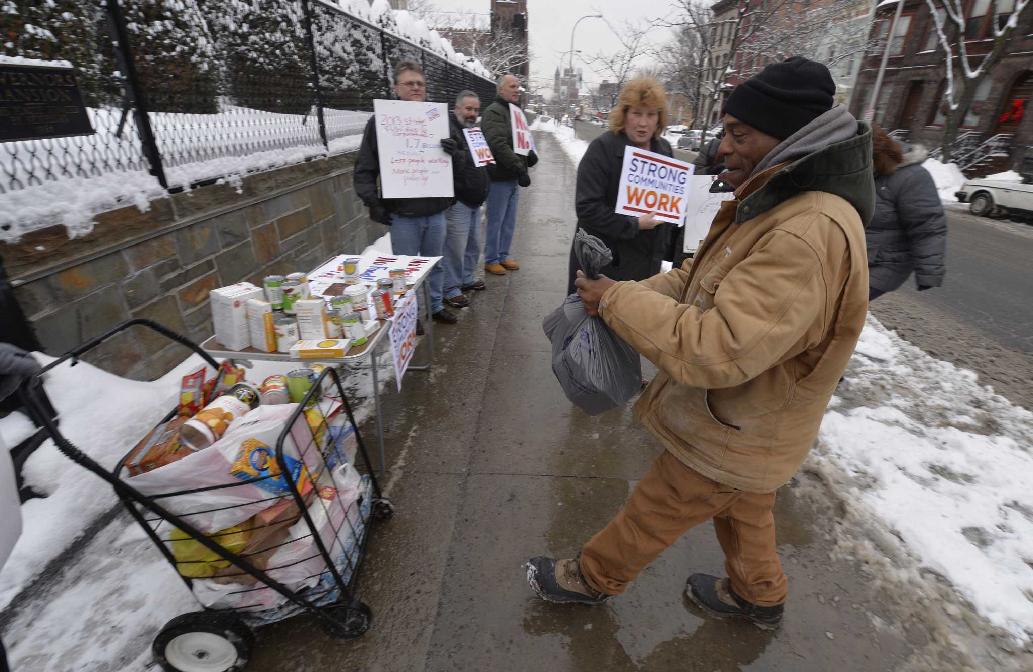 Poverty fight outside mansion