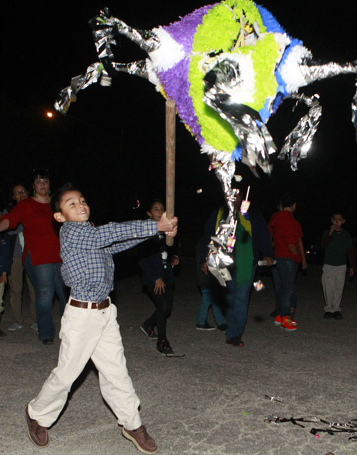 Las Posadas procession reaches across generations