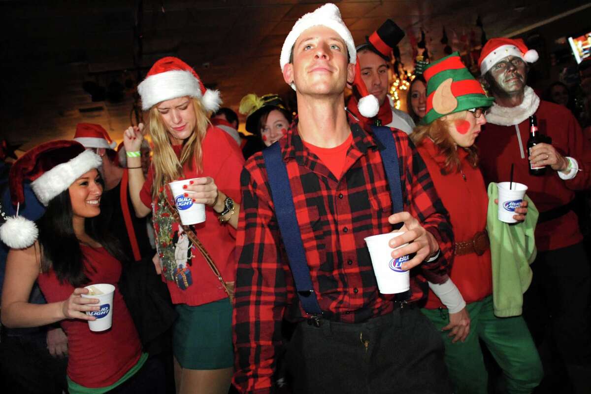 Photos: SantaCon benefits food pantry