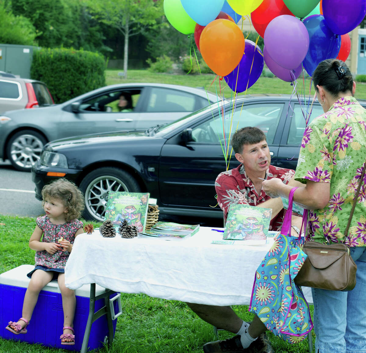 LaFontan signs copies of 'The Little Boy'