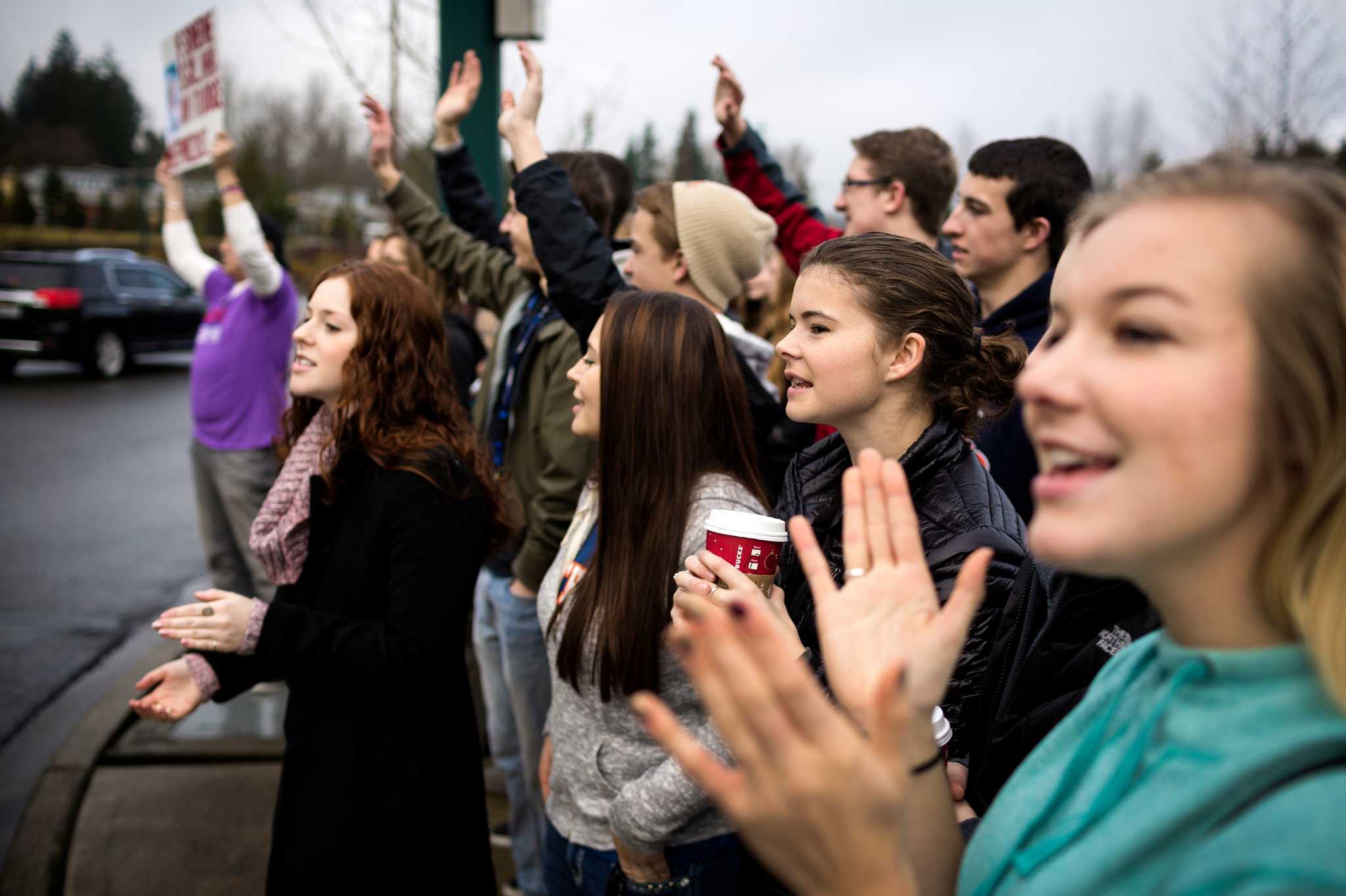 Eastside Catholic High School students rally for Mark Zmuda