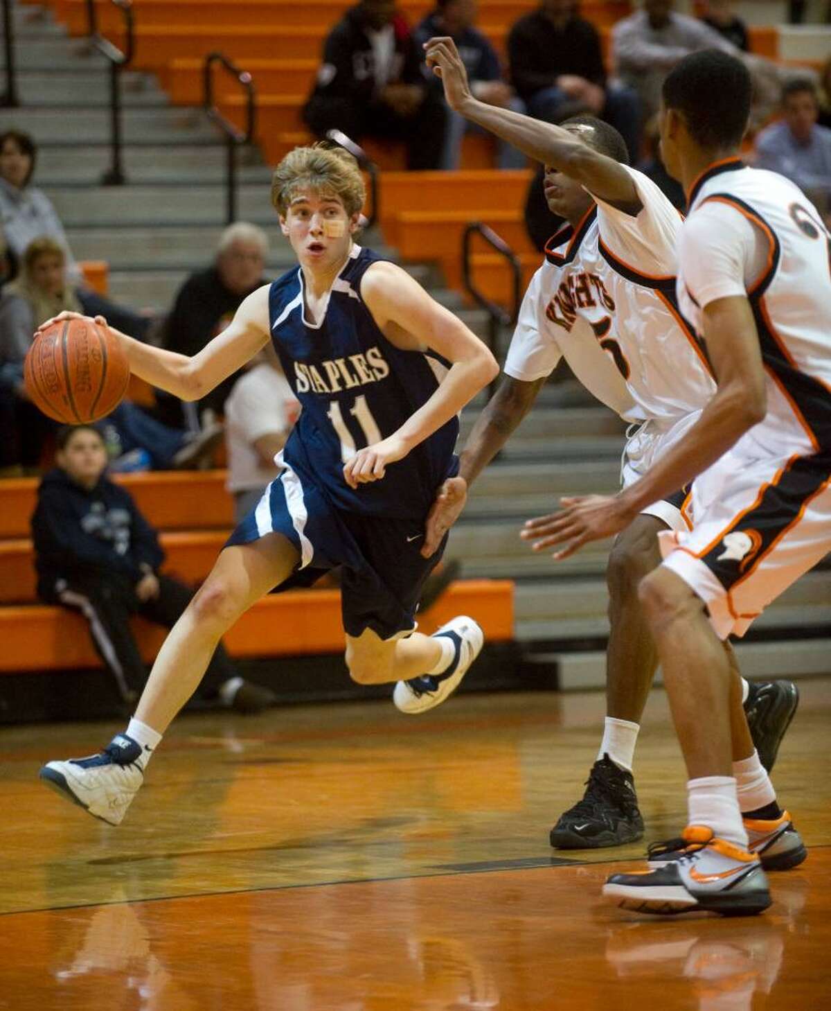 Stamford falls to Staples in OT