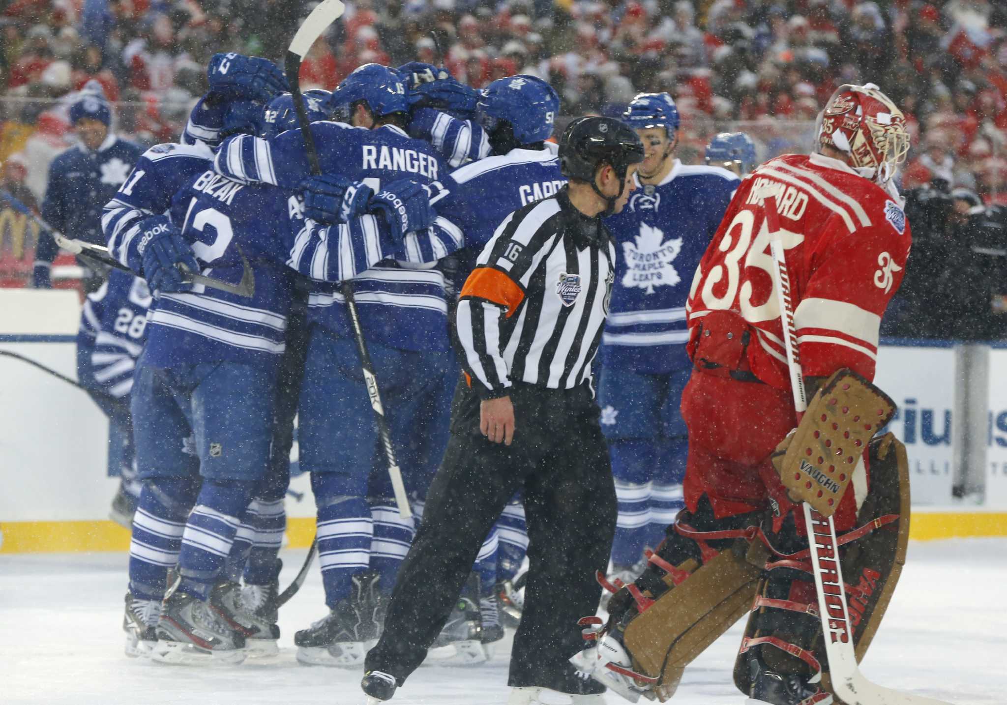 Record crowd sees hockey in snow