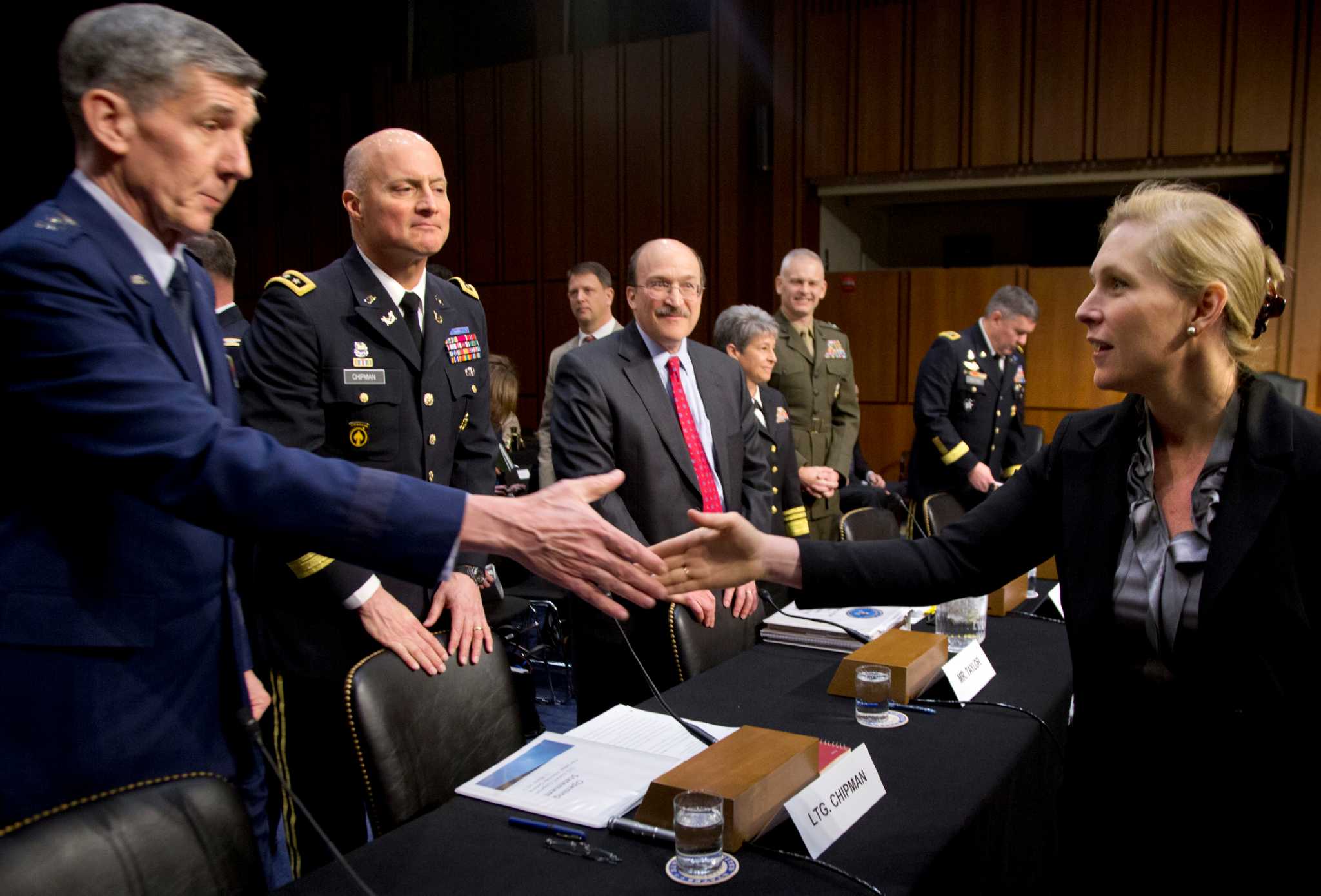 Panel urges caution in changing military law