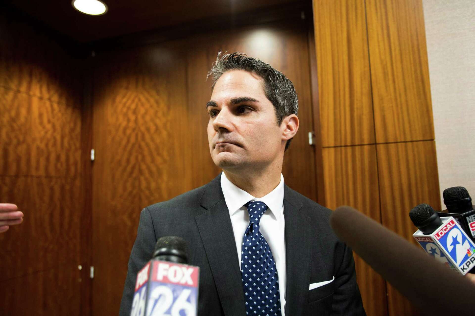 Estranged husband charged in woman's death