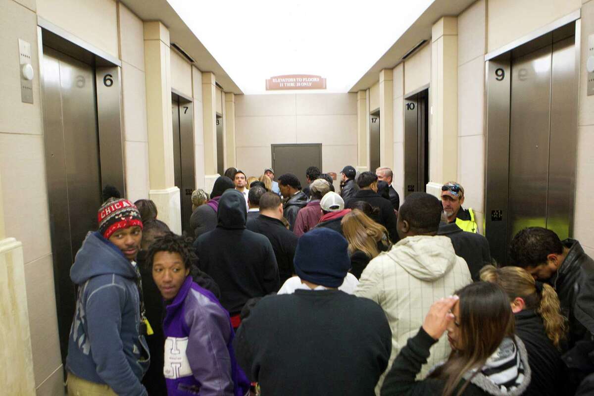 People Waiting For Elevator