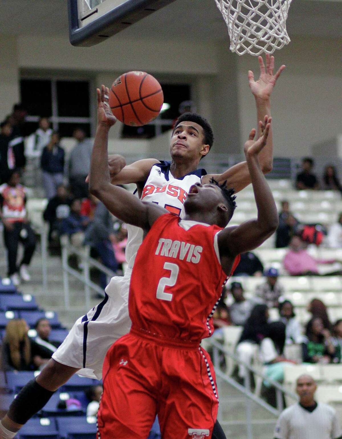 Travis shows it's in good hands with win over rival Bush