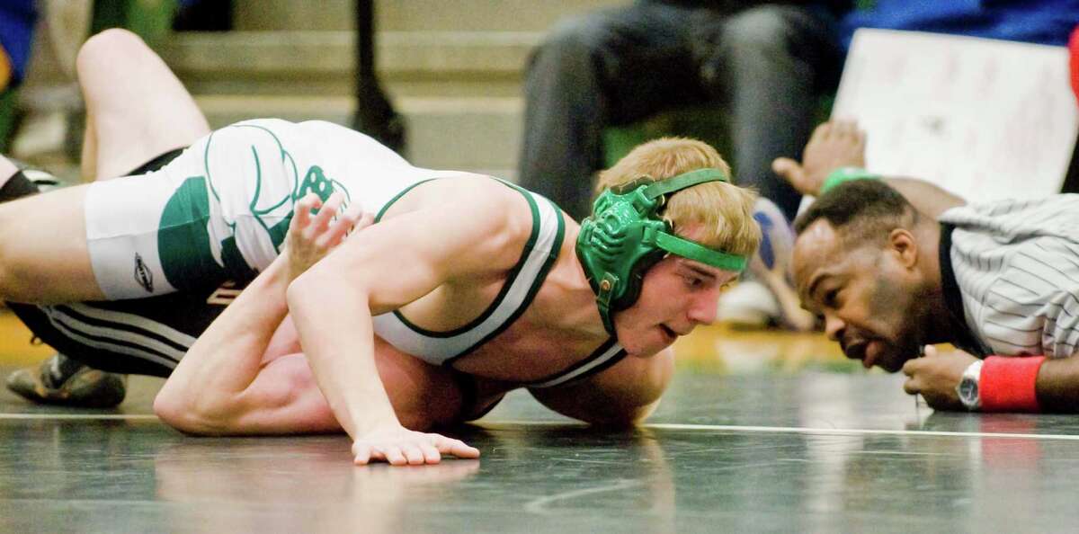 New Milford wrestlers dominate own tournament