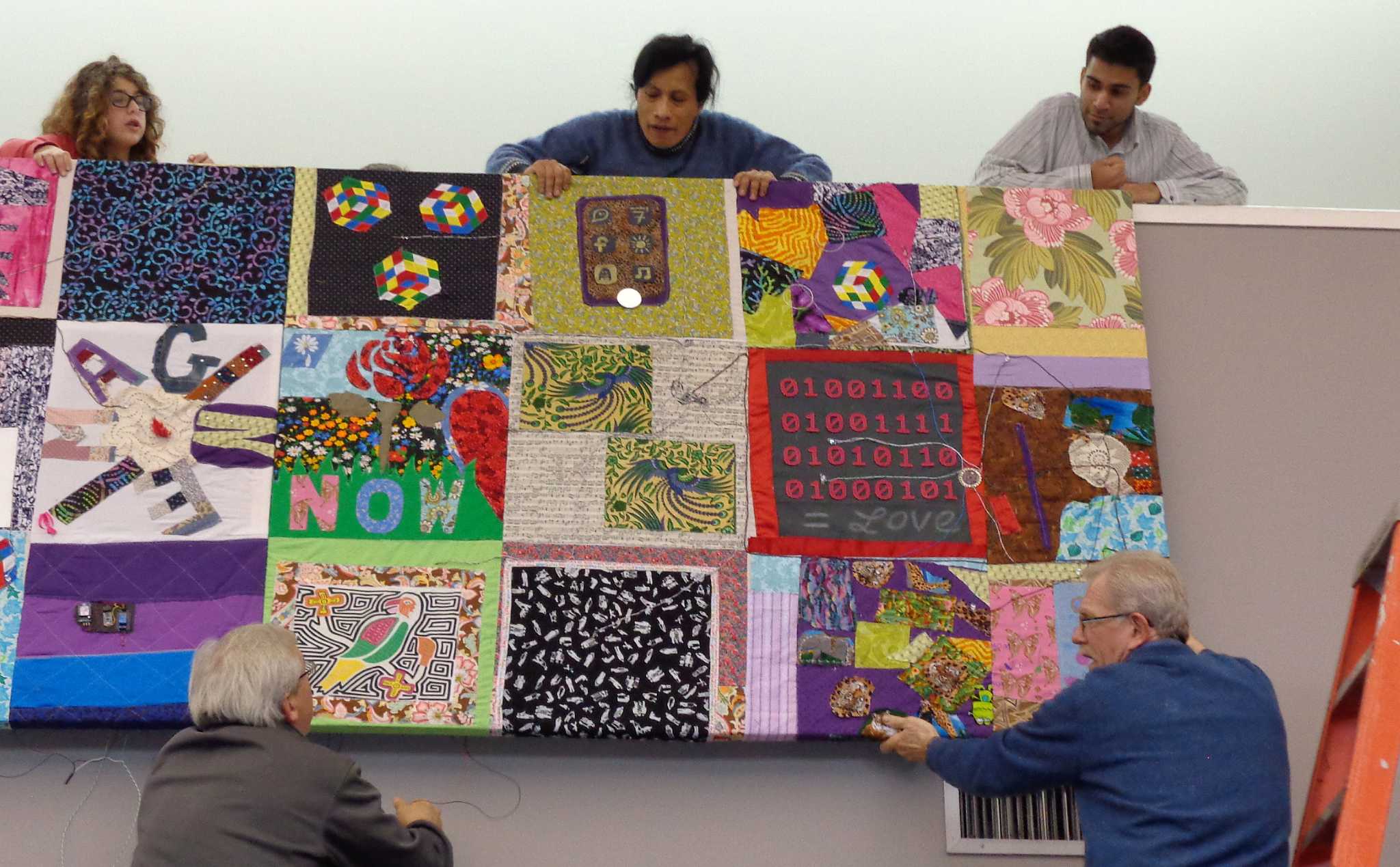 High-tech quilting project knits together Westport community