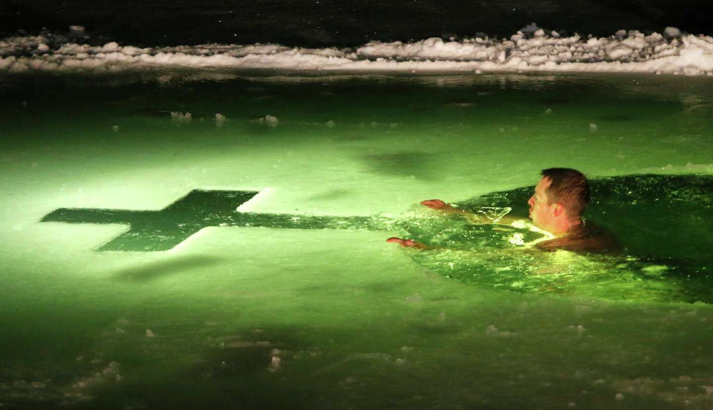 Surprising photos from Russian Orthodox Epiphany plunges