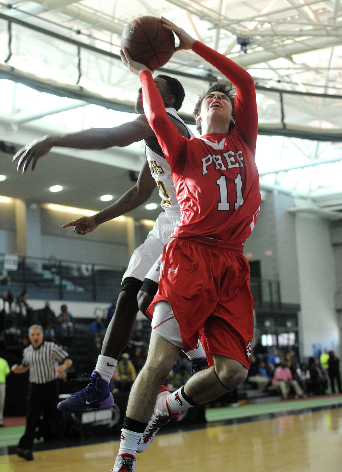 Prep basketball stays undefeated with late rally over Career Magnet