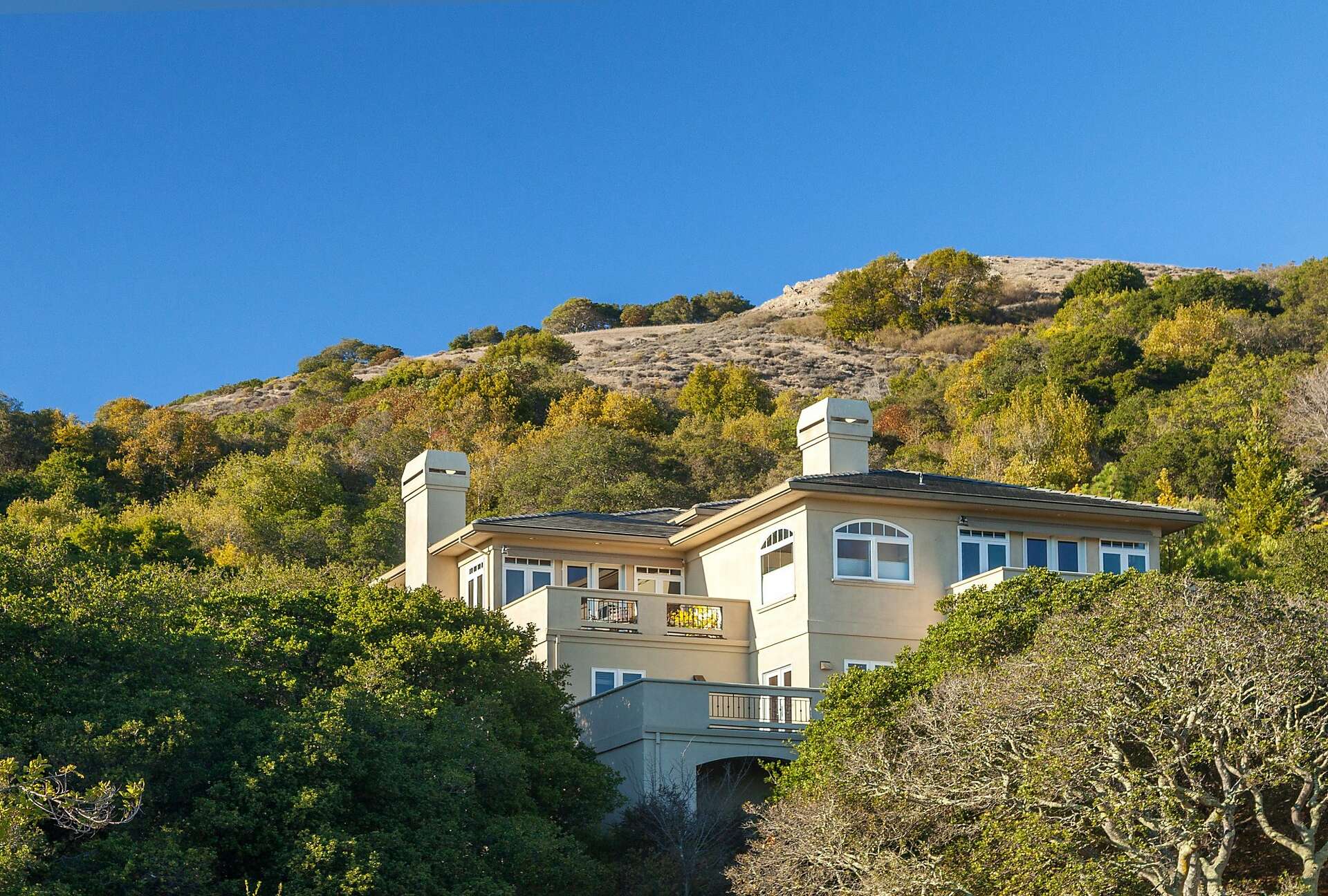 San Rafael home has multiple patios in tranquil setting