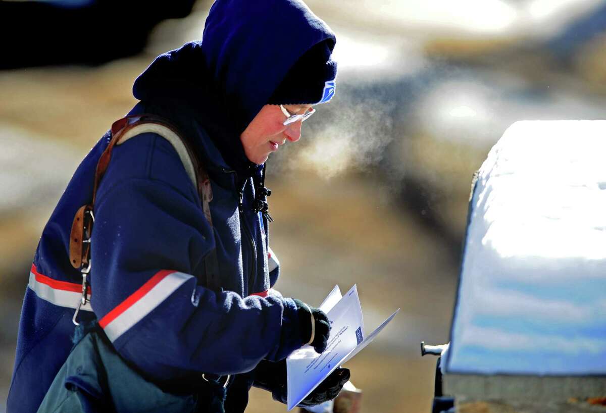 Snow moves out, leaves bitter cold and wind behind
