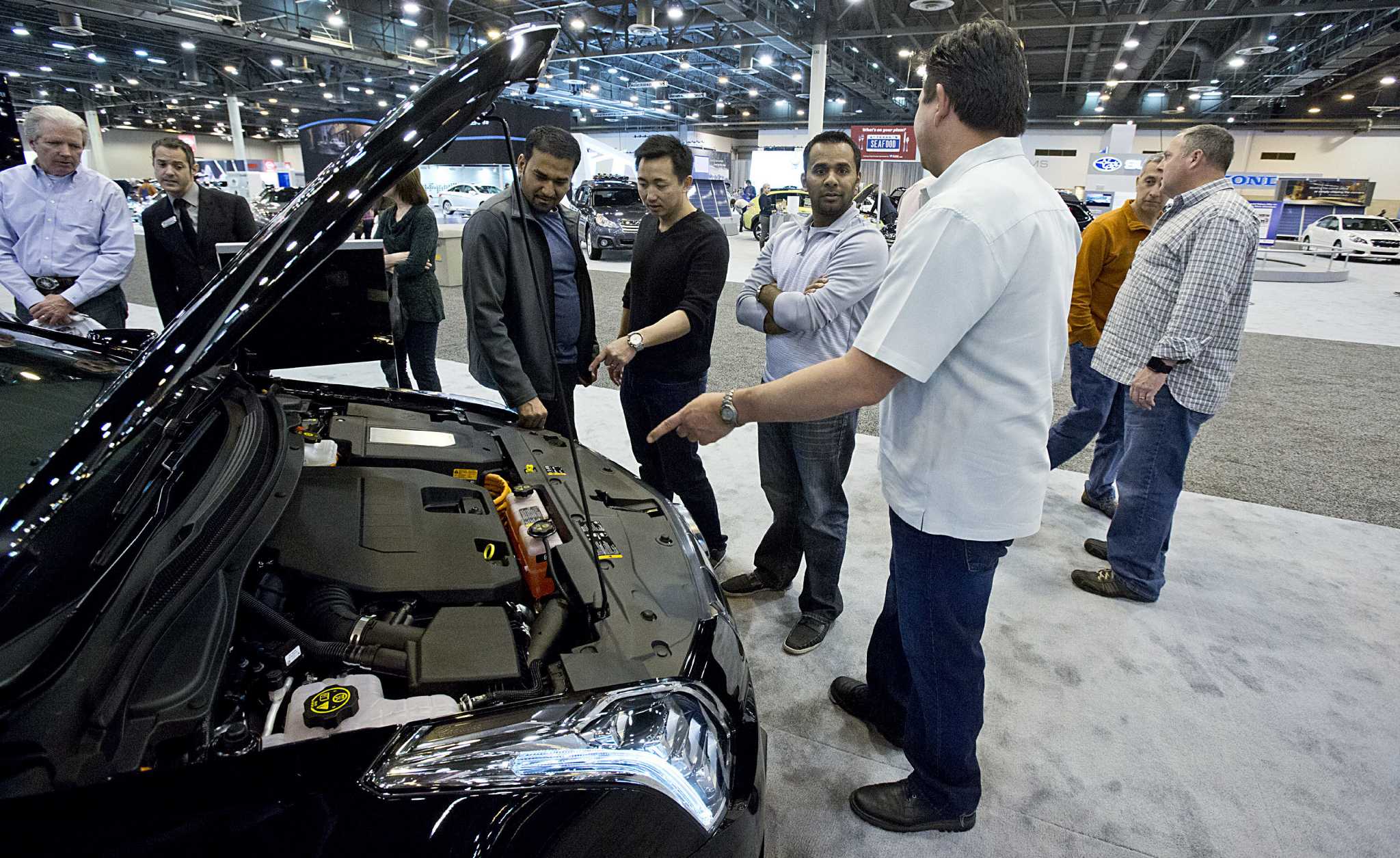 Auto show electrifies some before they know it