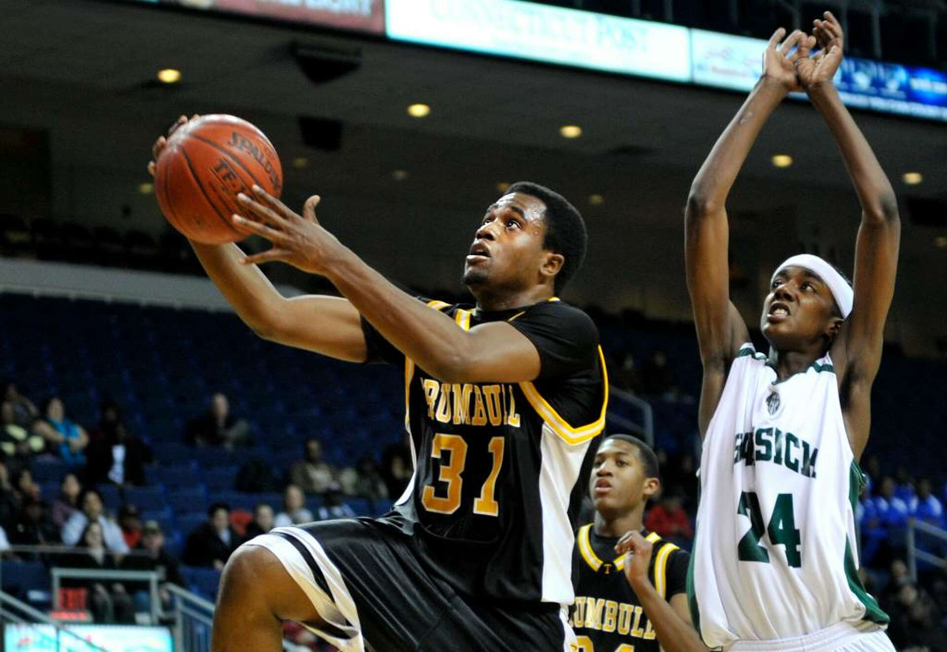 Trumbull tips Bassick in overtime in Bridgeport Basketball Classic