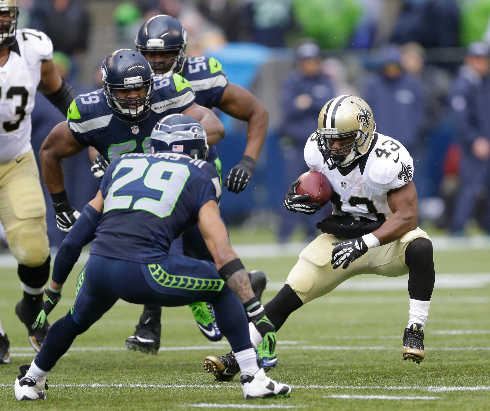 Thomas gives Seahawks brains to complement brawny DBs