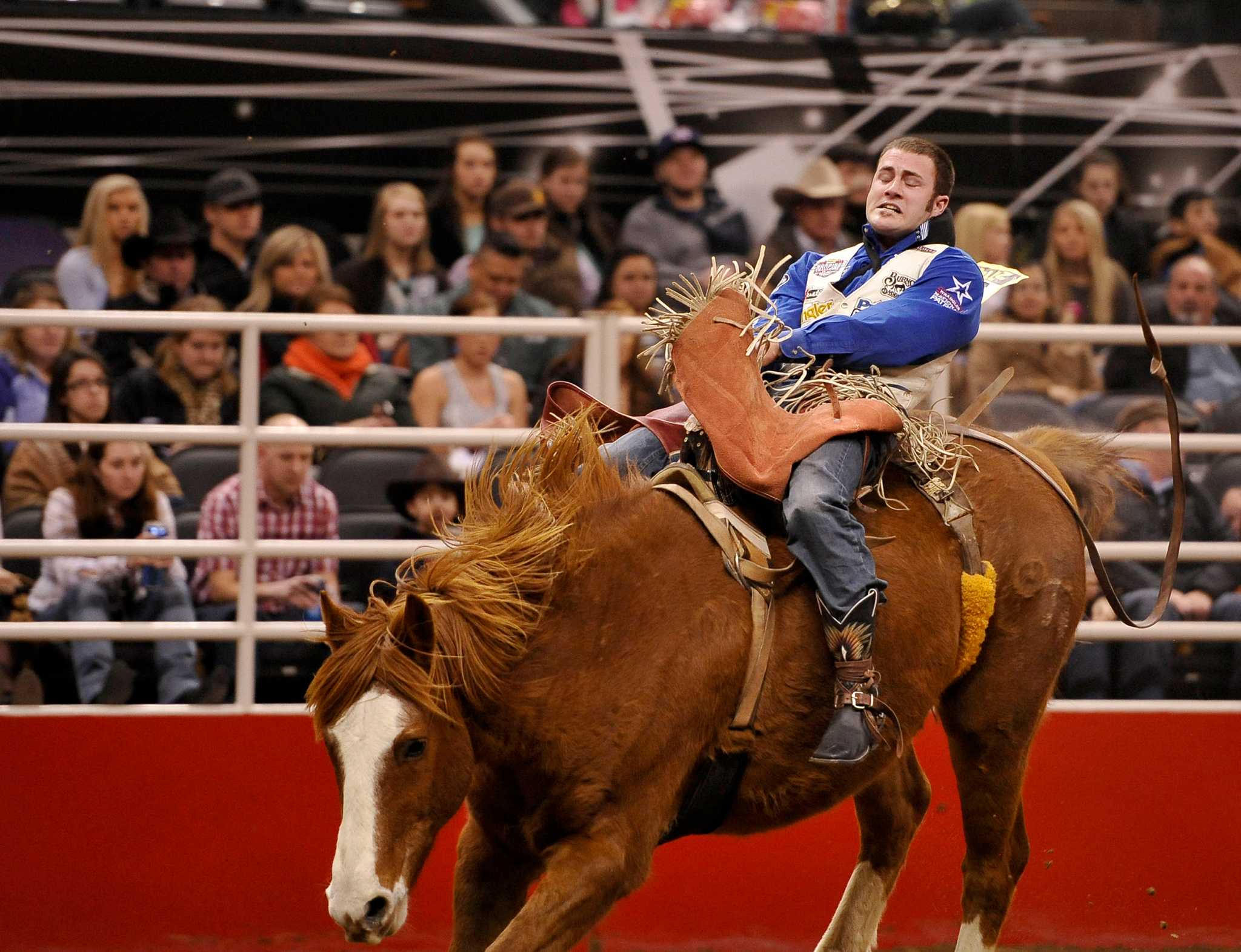 When he's not busting a bronc, he's raising soldiers' morale
