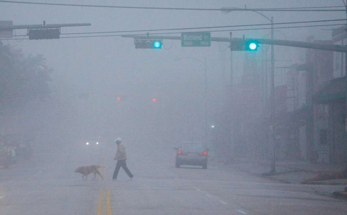 Dense fog shrouds Houston's early morning commute