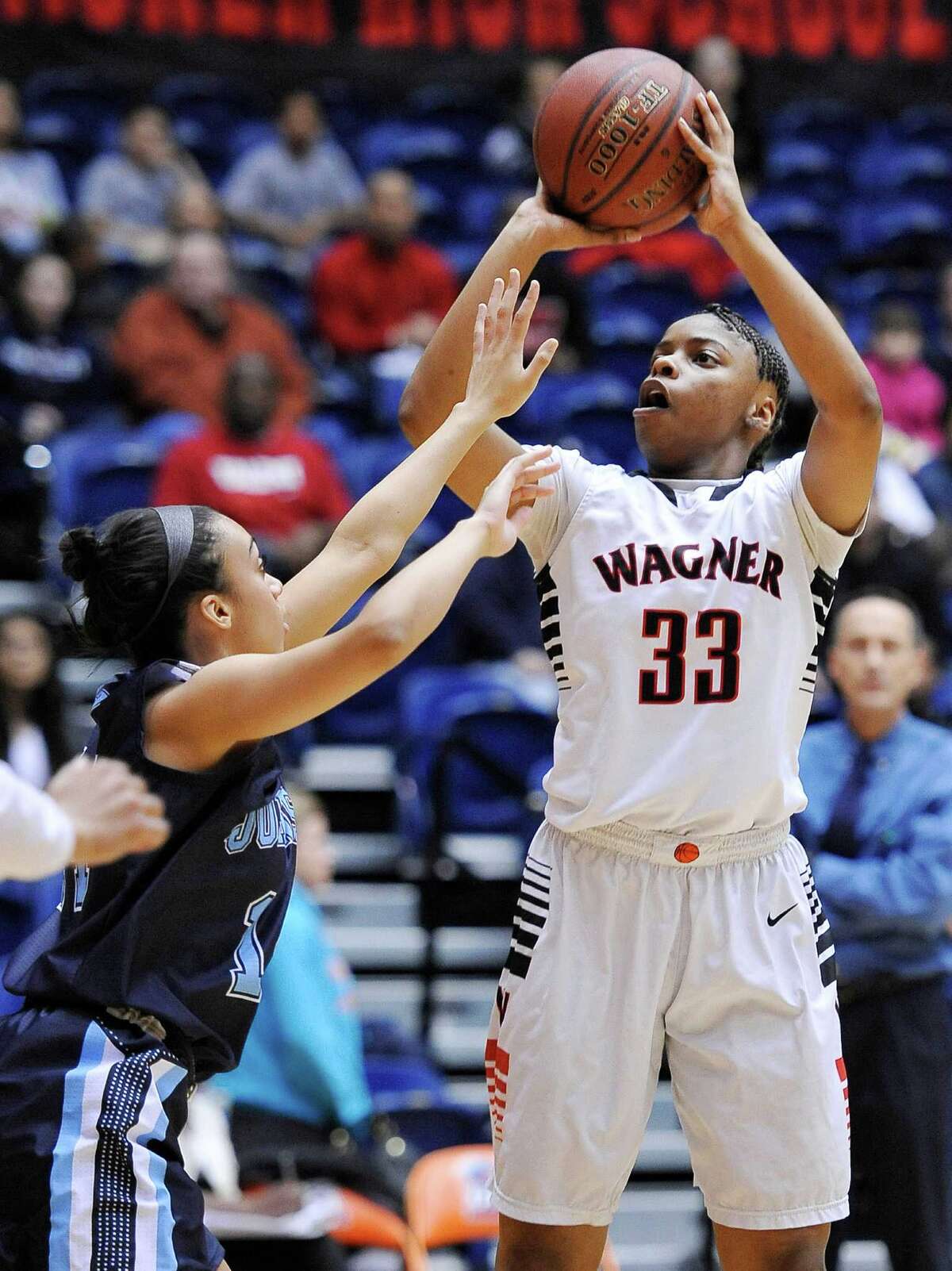 Wagner's late surge clips Johnson; Judson halts Roosevelt