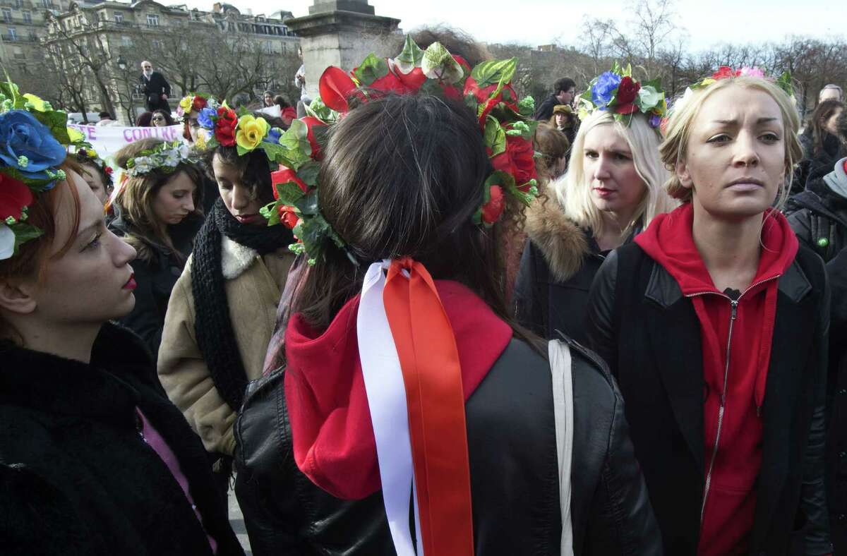 World news photos: Apathy protest, naked sledding and more