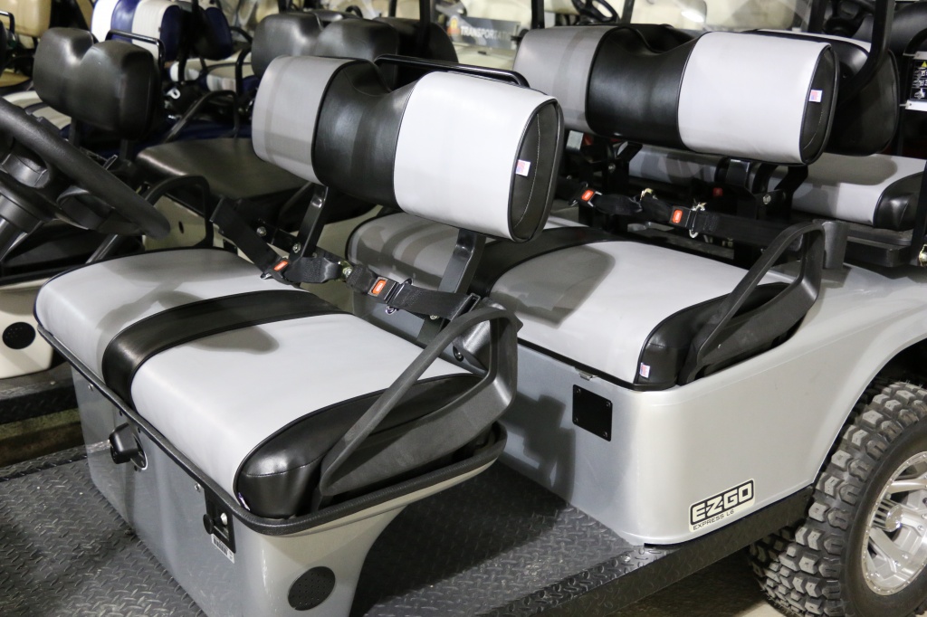 Some Rodeo volunteers ride chauffeured golf carts. Some shovel poop.