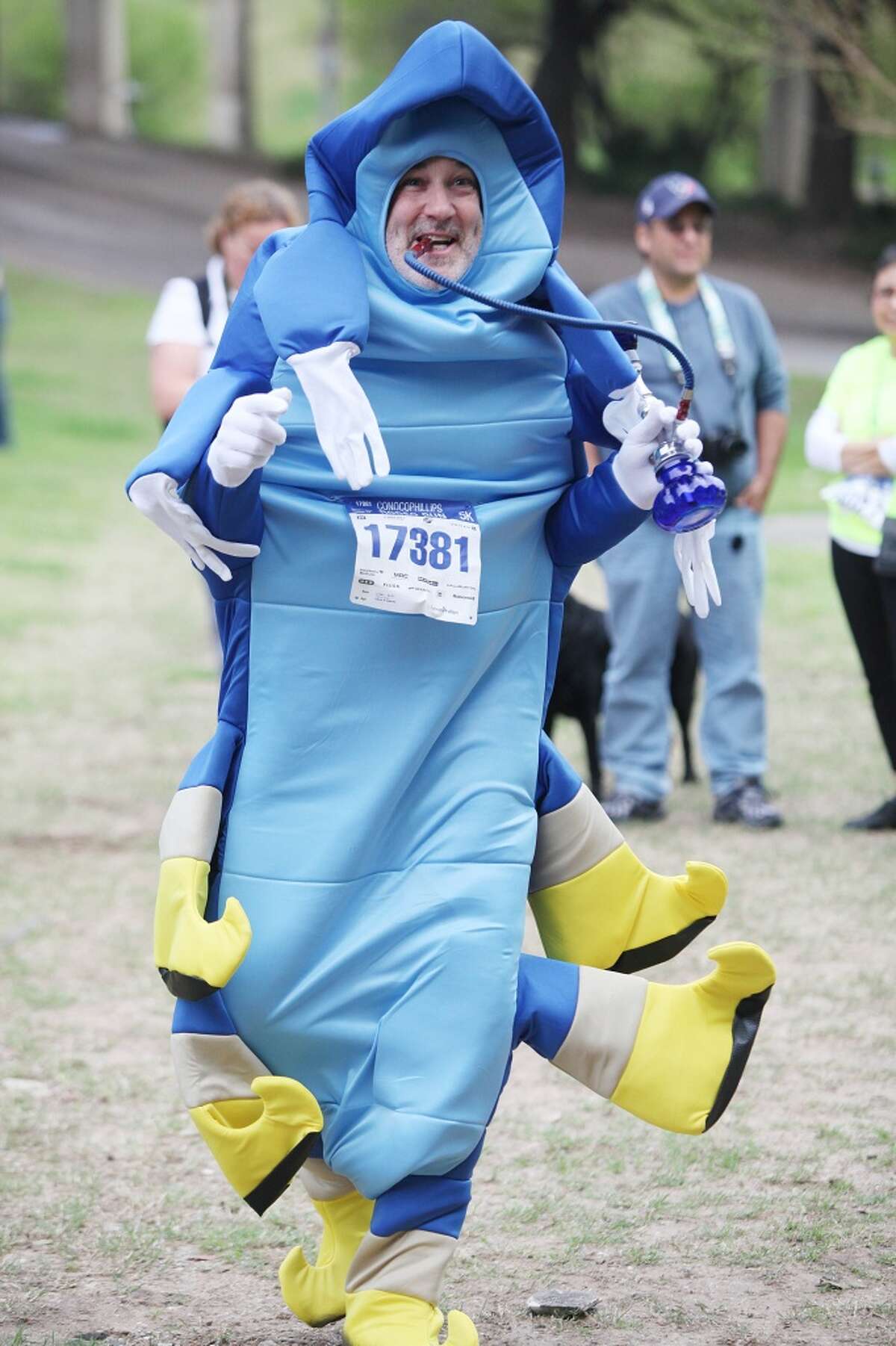 Cowboys trek through downtown to Rodeo kickoff