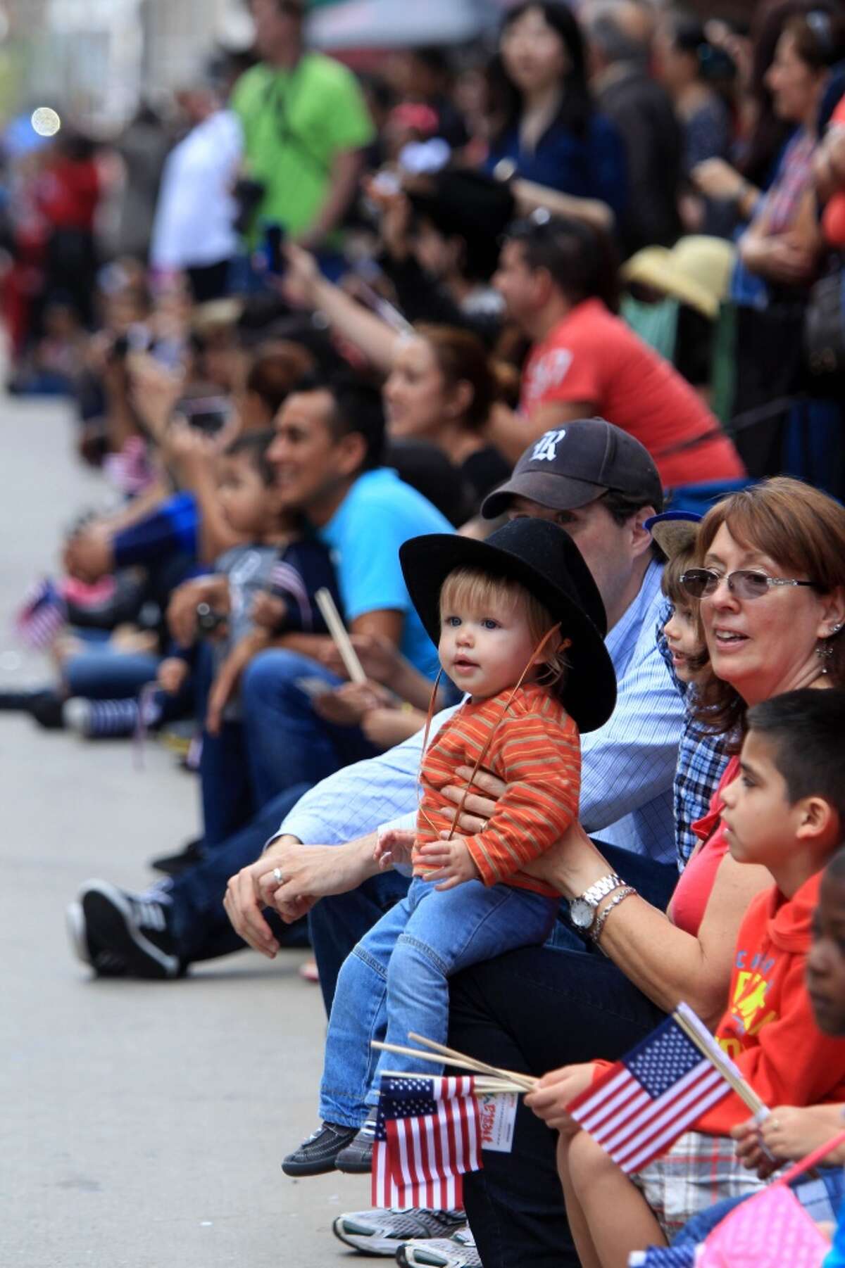 Cowboys trek through downtown to Rodeo kickoff
