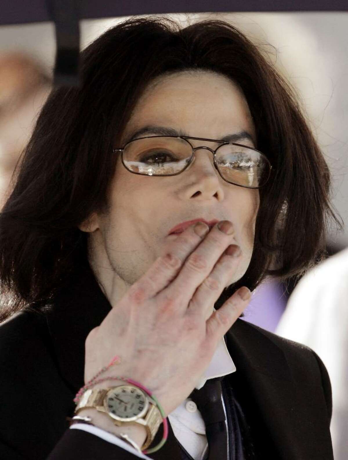 Michael Jackson's doctor charged in singer's death