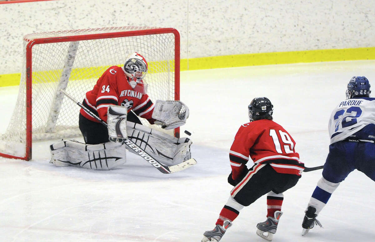 New Canaan upsets Darien to win FCIAC hockey championship