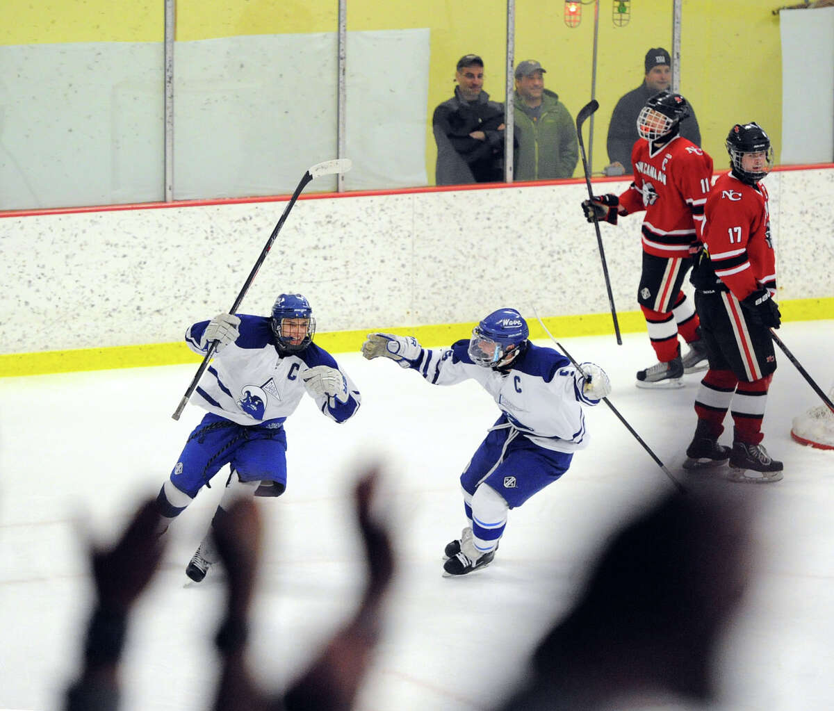 New Canaan upsets Darien to win FCIAC hockey championship