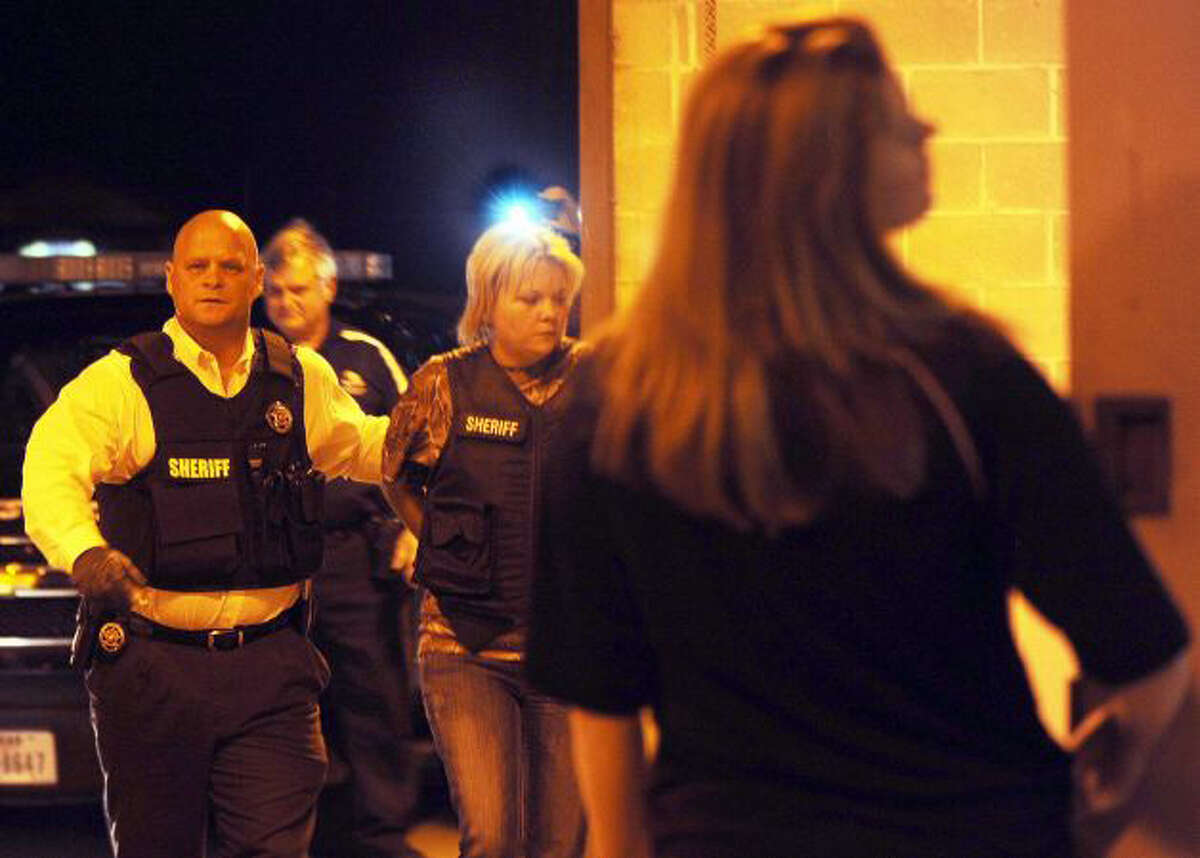 Guns in Tyler Co. couple's slaying found in pond