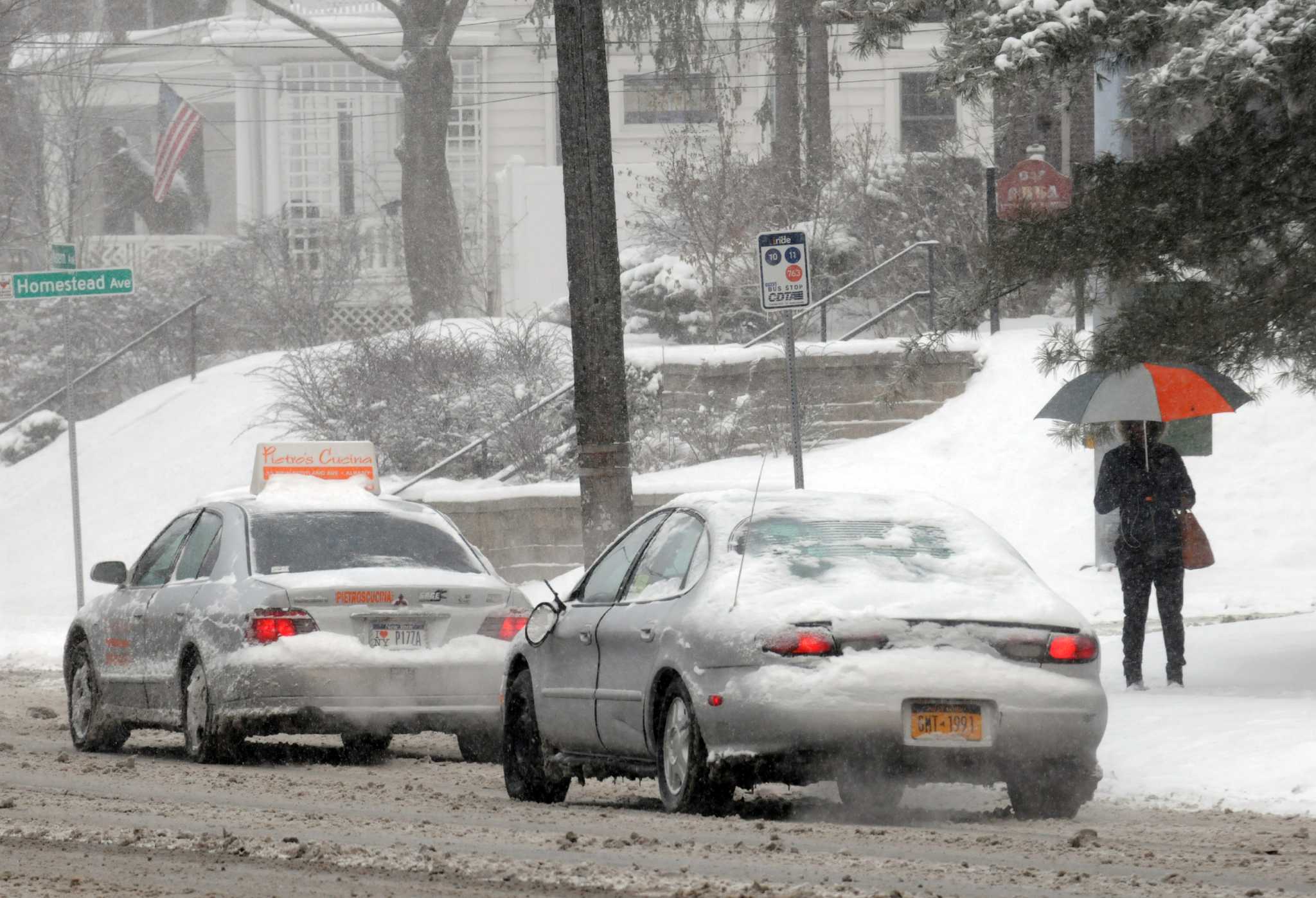 Photos: Windy, icy, snowy day all over