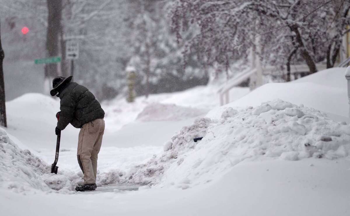 Photos: Windy, icy, snowy day all over