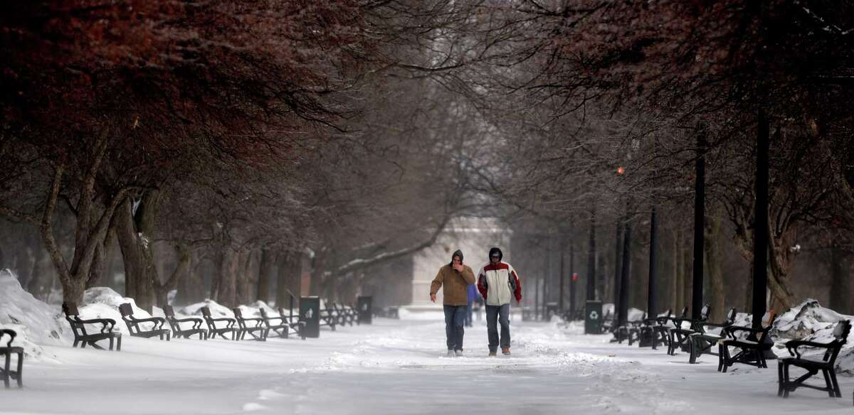 Photos: Windy, icy, snowy day all over