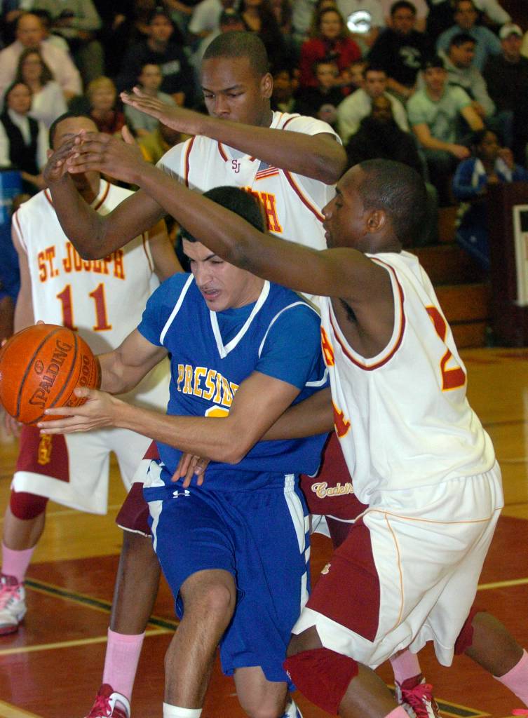 St. Joseph pulls away to beat Harding