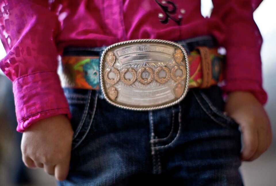Rodeo competitors show their pride with trophy buckles