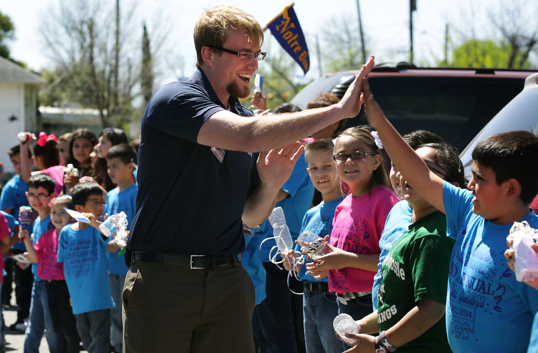 Bus tour cheers on Catholic schools