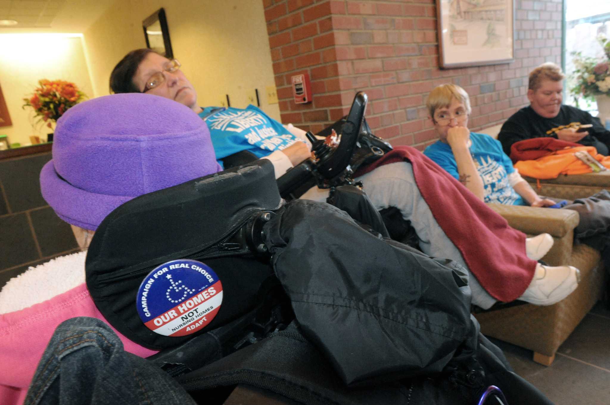 Disabled protesters target nurses' group