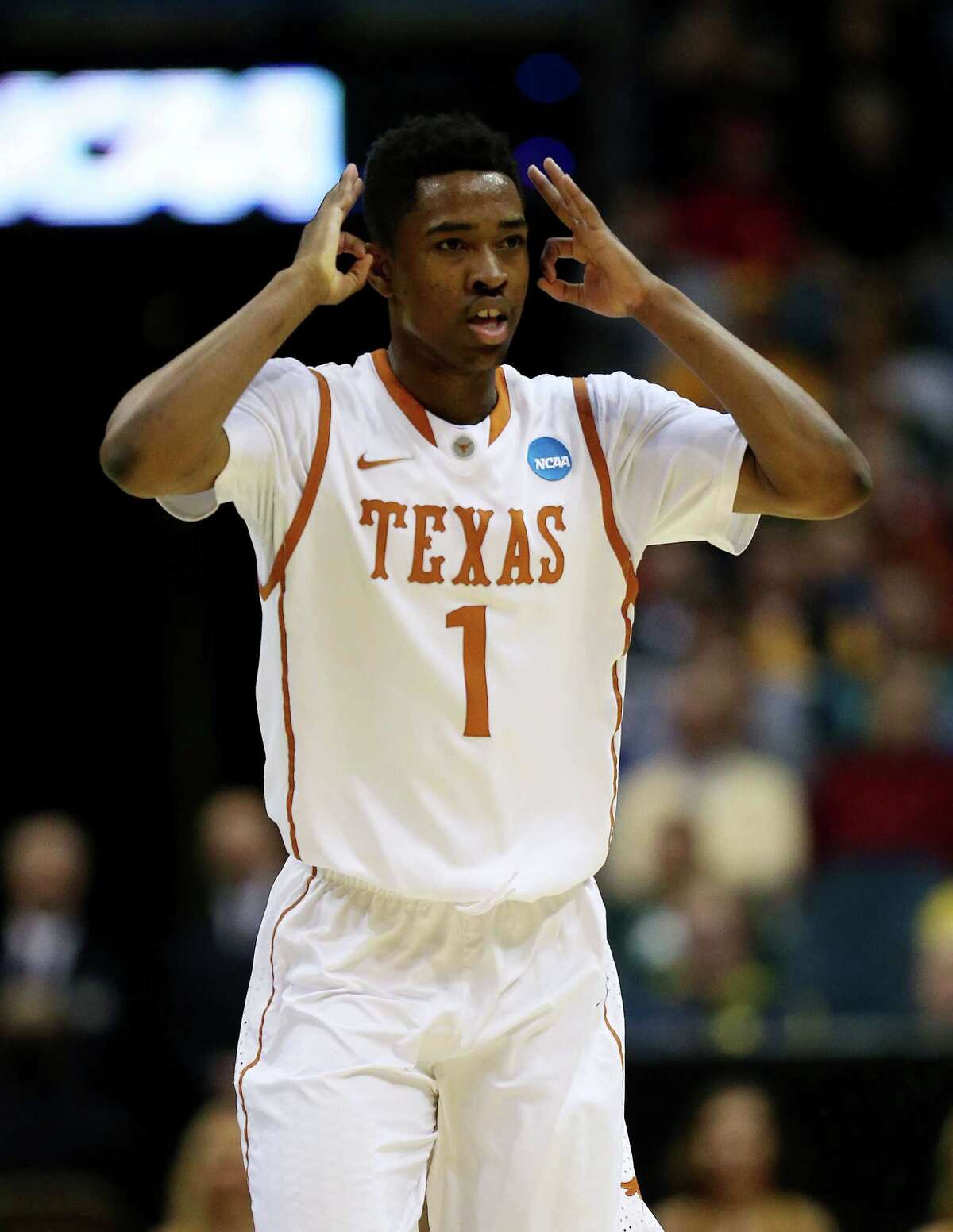 Longhorns beat the horn, nip Arizona State