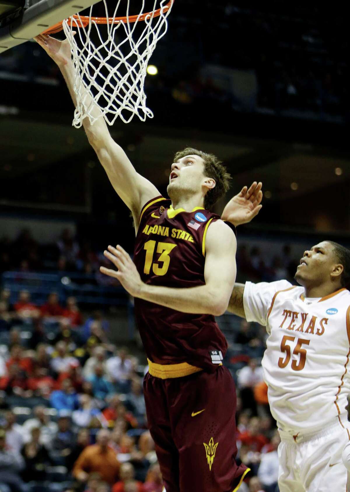 Longhorns beat the horn, nip Arizona State