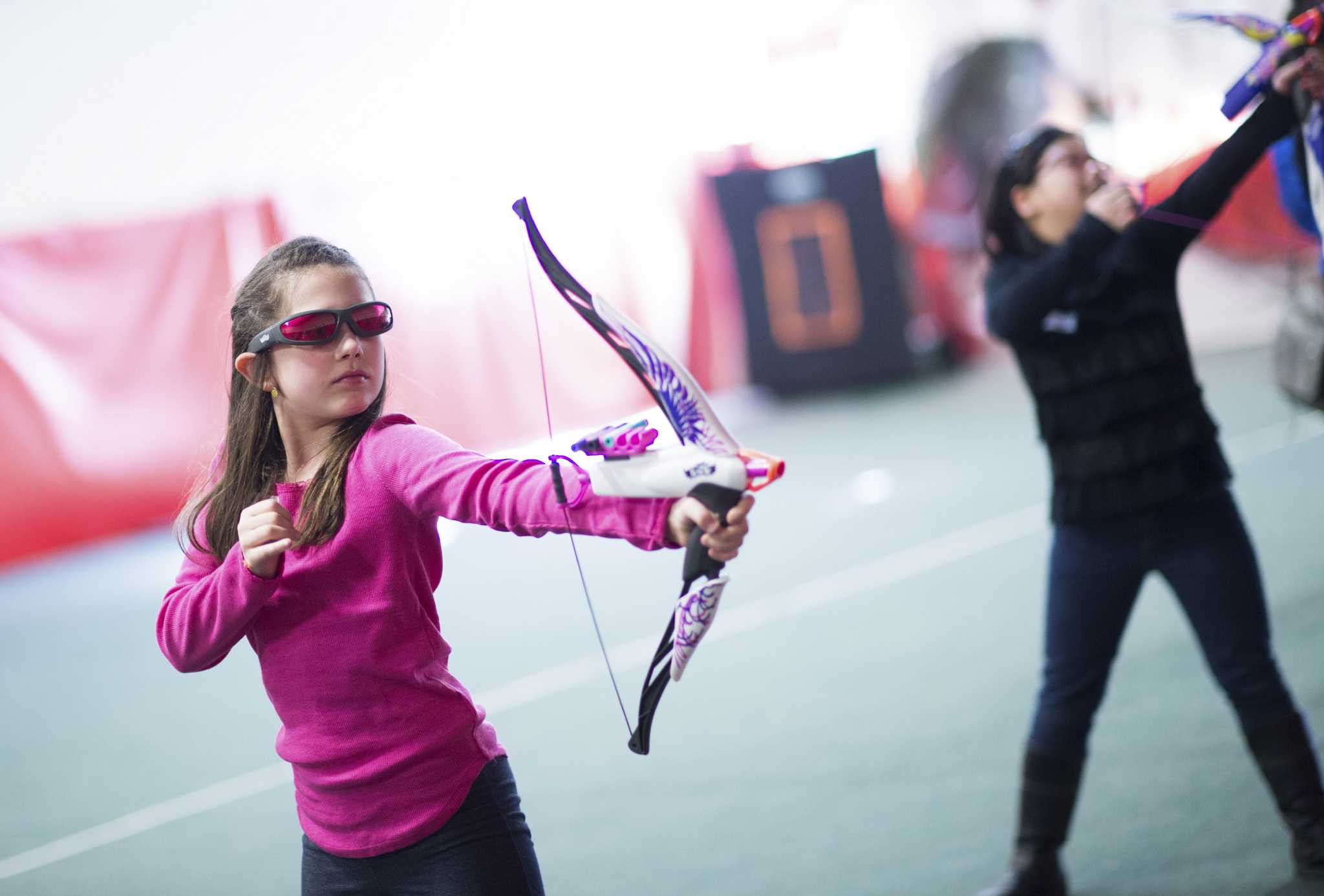 Today's girls love pink bows as playthings, but these shoot