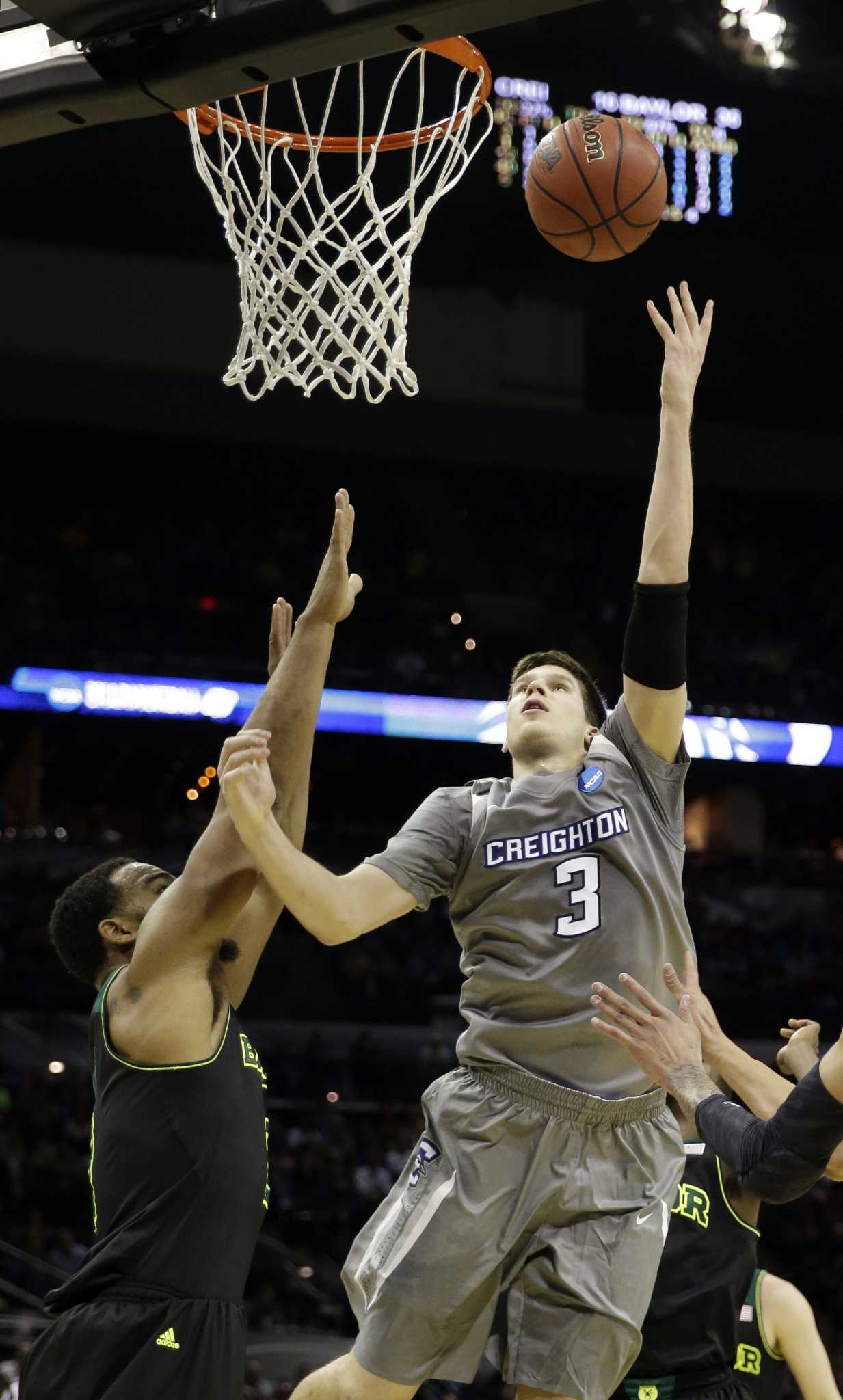 Add basketball to Catholics' springtime rituals