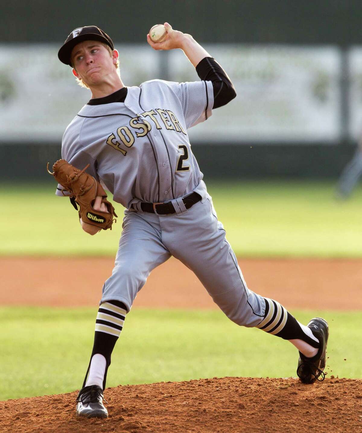 Foster baseball playing with a mission