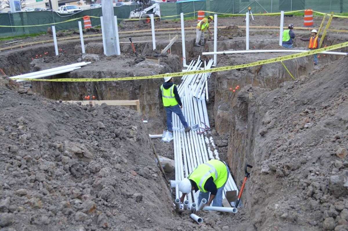 6-story cross and water wall going up at major Houston highway intersection